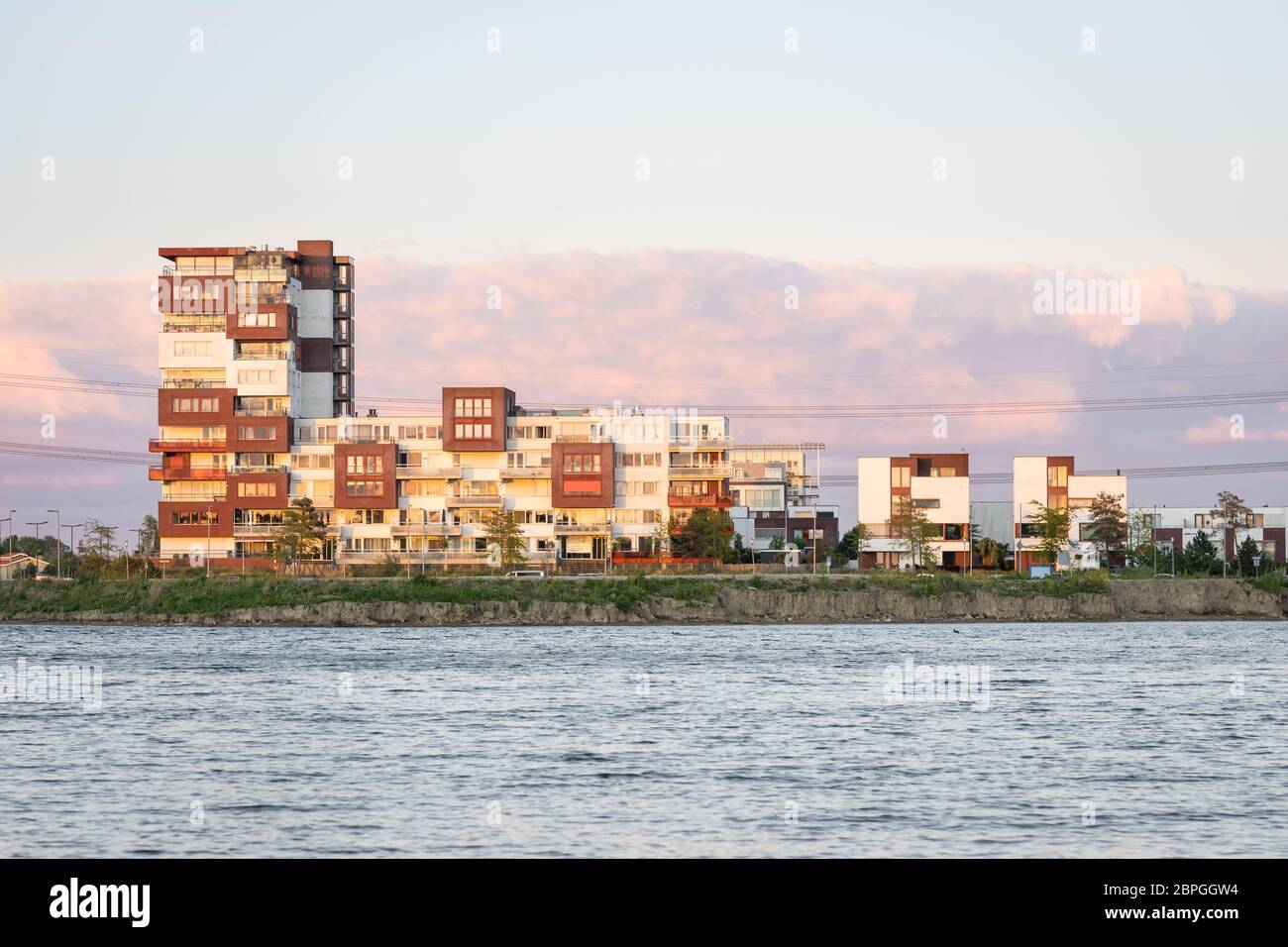 Modern architecture along the water of a lake. Residential buildings in ...