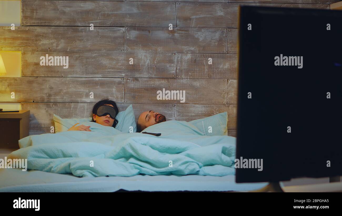 Woman watching man asleep hi-res stock photography and images - Alamy