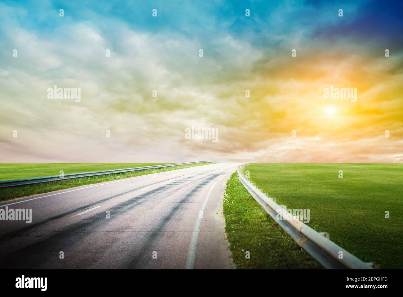 Panoramic road sunrise summer travel background Stock Photo - Alamy