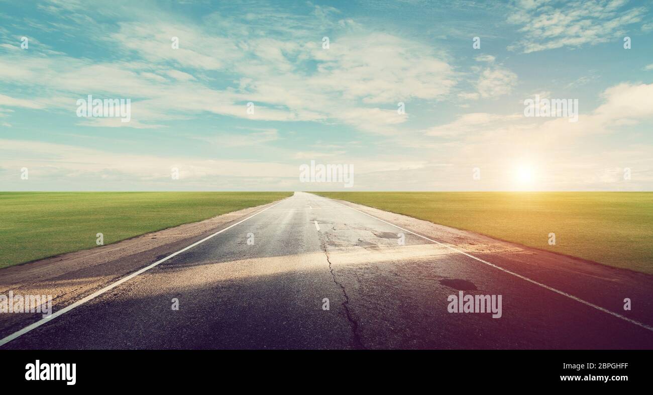 Panoramic road sunrise summer travel background Stock Photo - Alamy