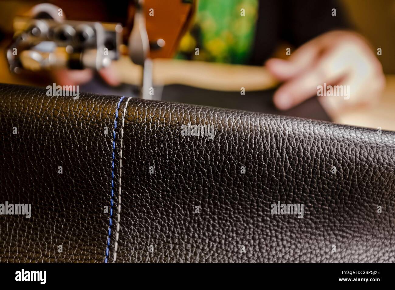 Needle and thread in leather hi-res stock photography and images - Alamy