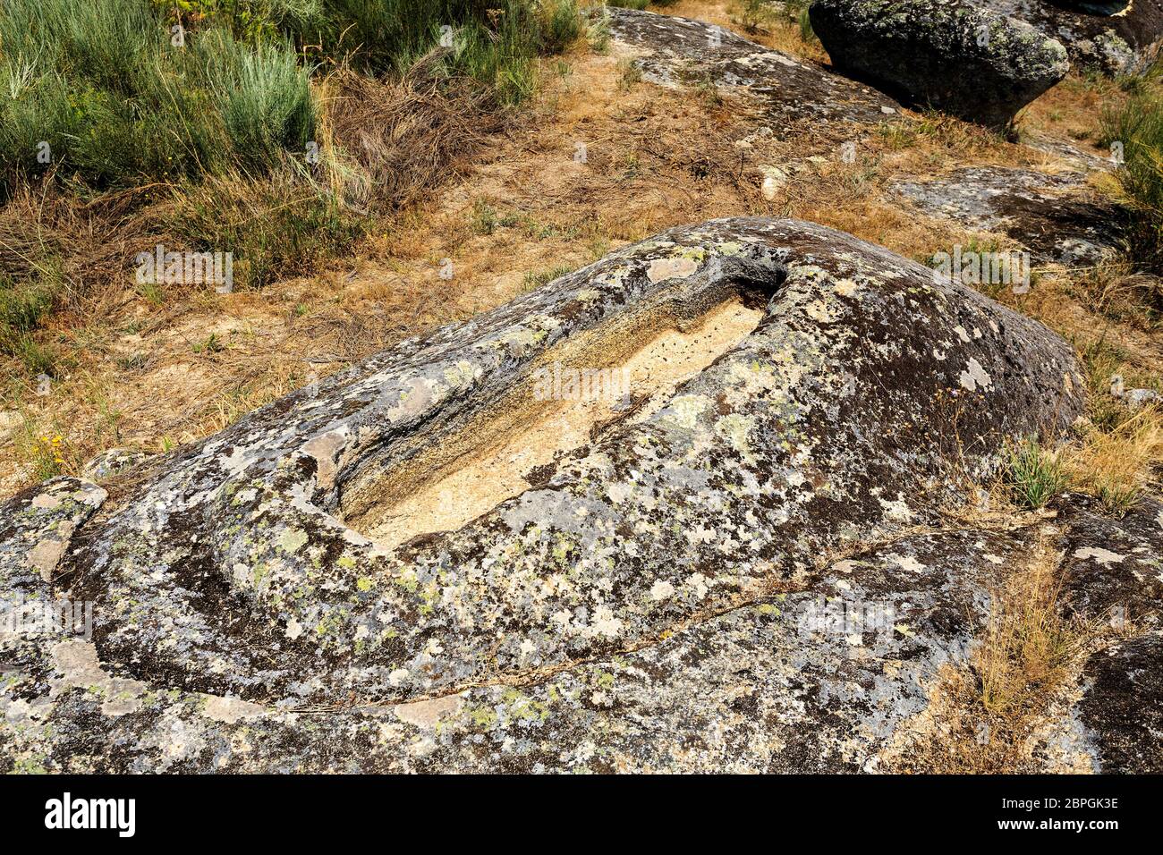 View of a granite rock cut anthropomorphic grave, body-shaped form with ...