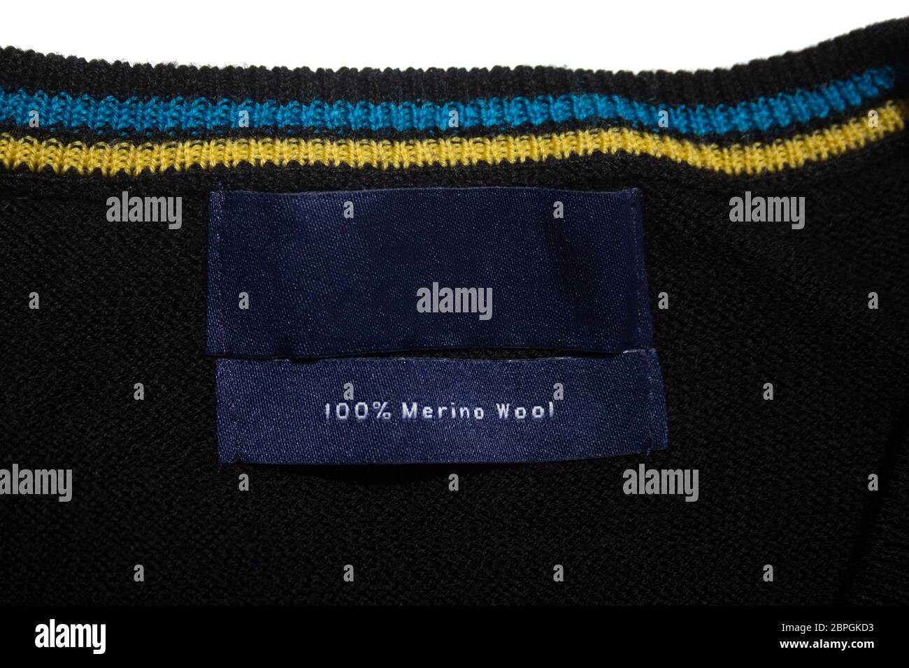 Blue Merino Wool Label on a jumper Stock Photo - Alamy