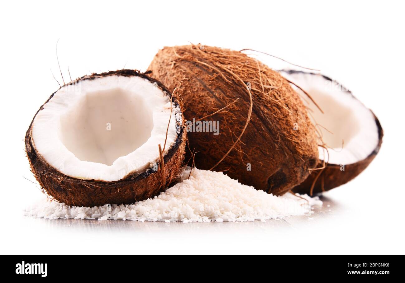 Composition with shredded coconut and shells isolated on white ...