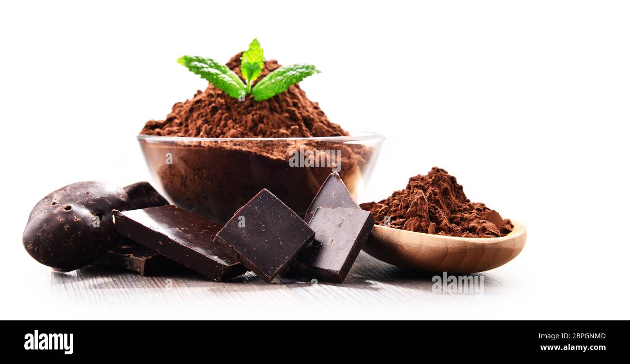 Composition with bowl of cocoa powder isolated on white Stock Photo - Alamy