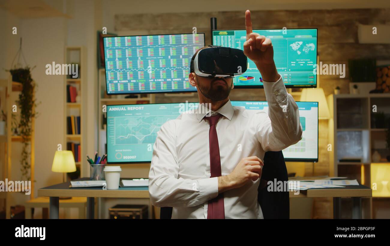 Male broker using computer home hi-res stock photography and images - Alamy