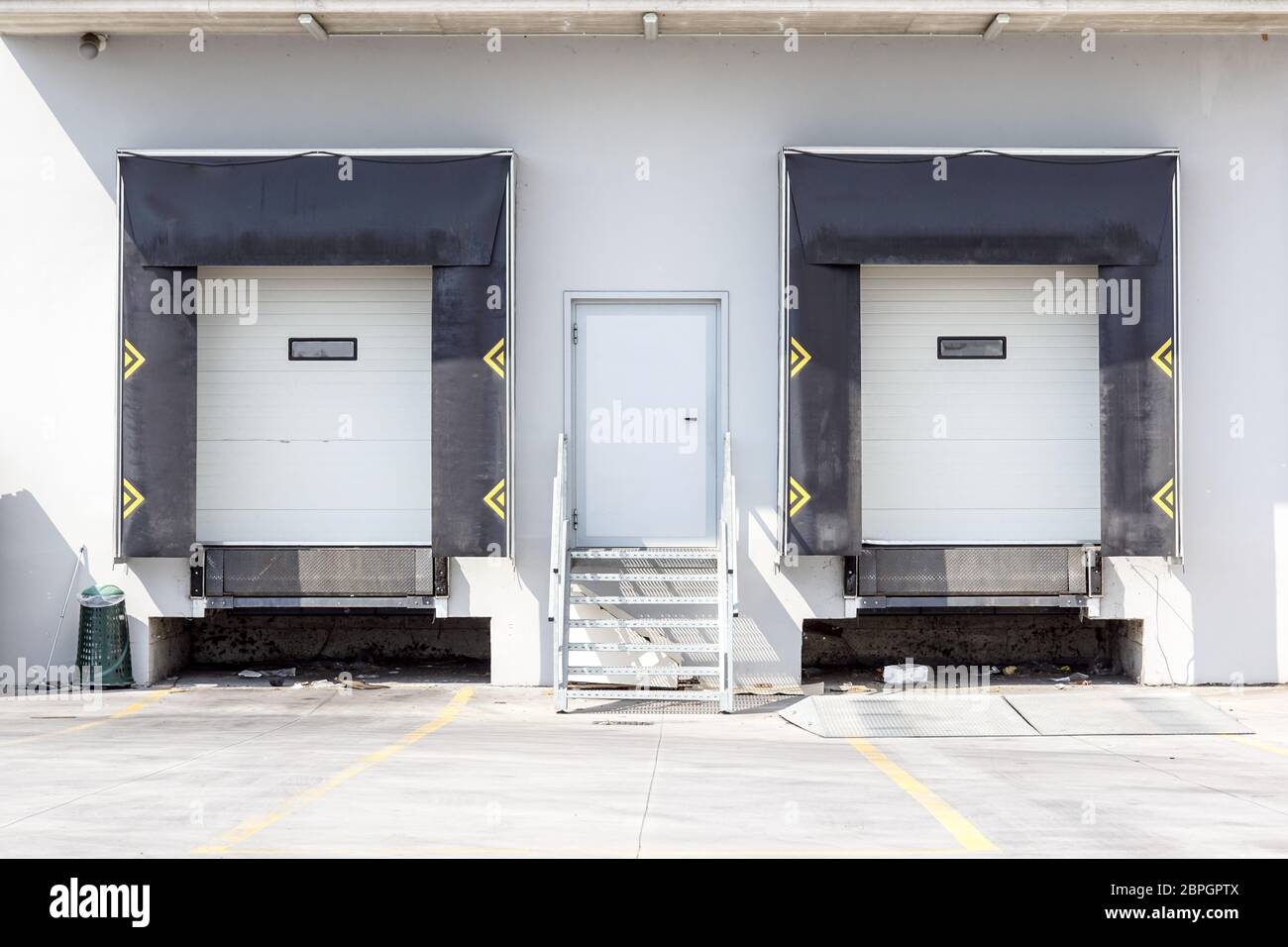 picture of door in industrial warehouse Stock Photo - Alamy