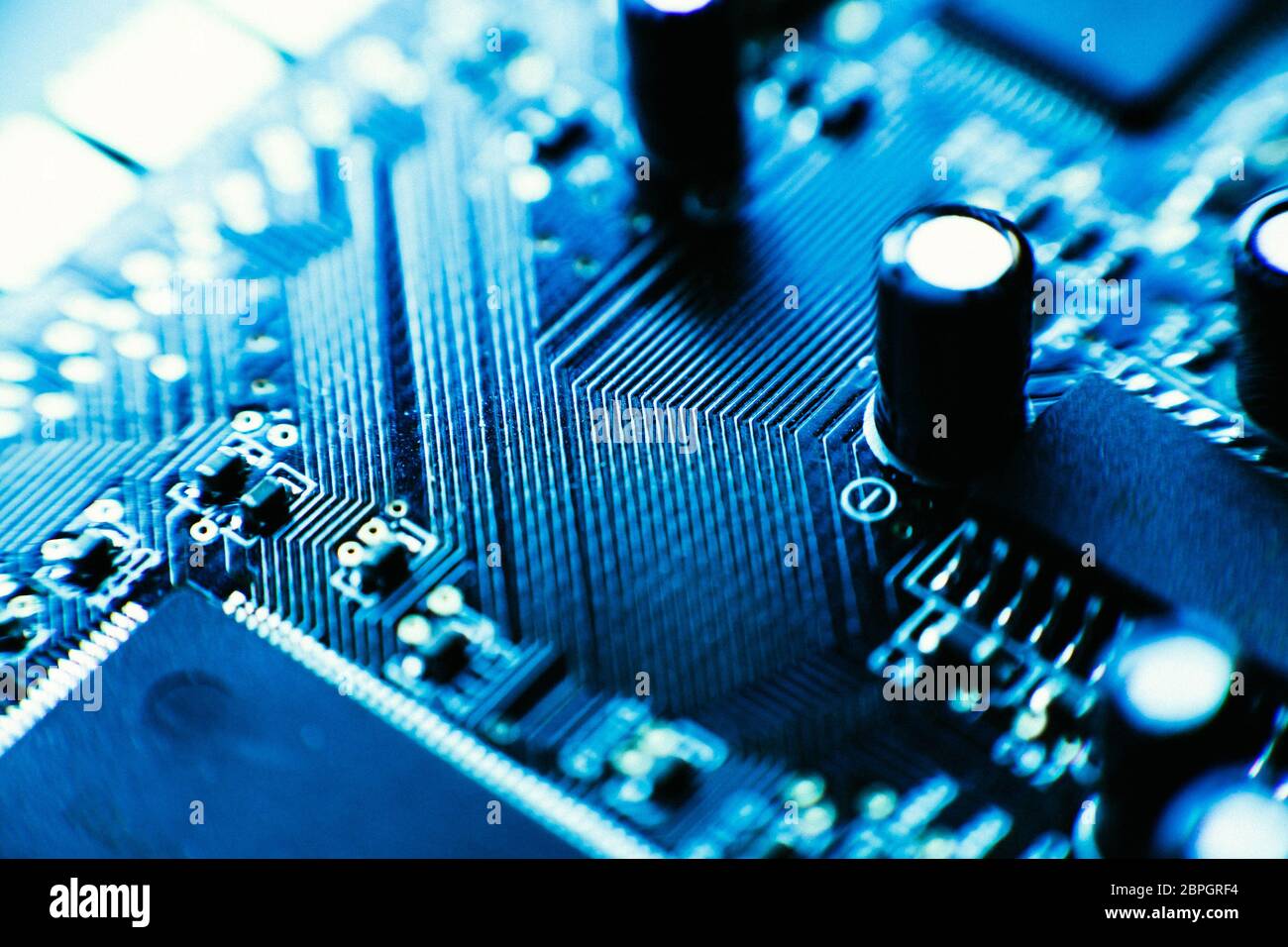 computer board capacitors blue color close up Stock Photo - Alamy