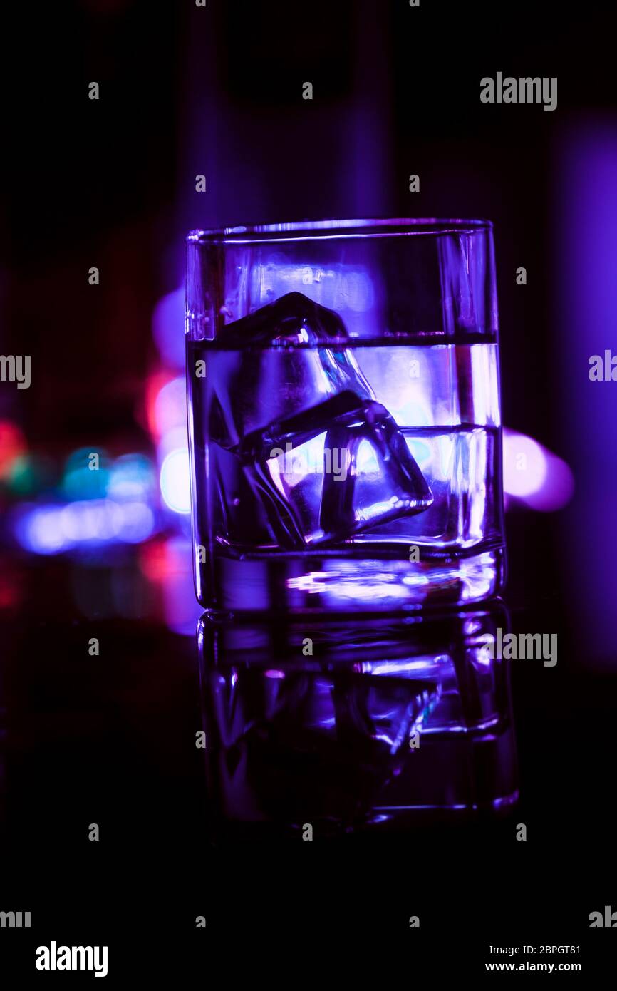 colored lighting of glasses in the night club bar Stock Photo - Alamy
