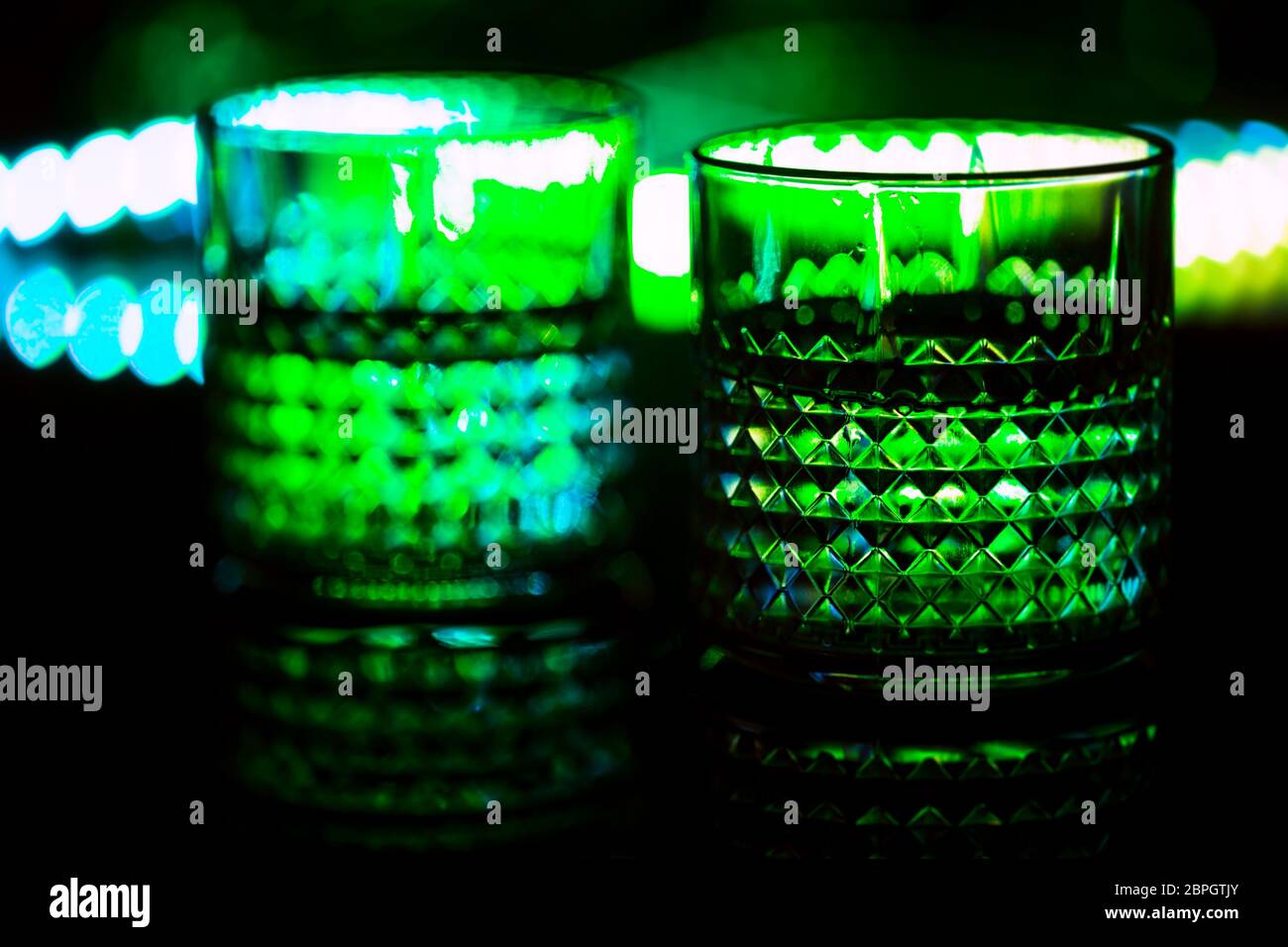 bar colored lights with glasses of alcohol Stock Photo - Alamy