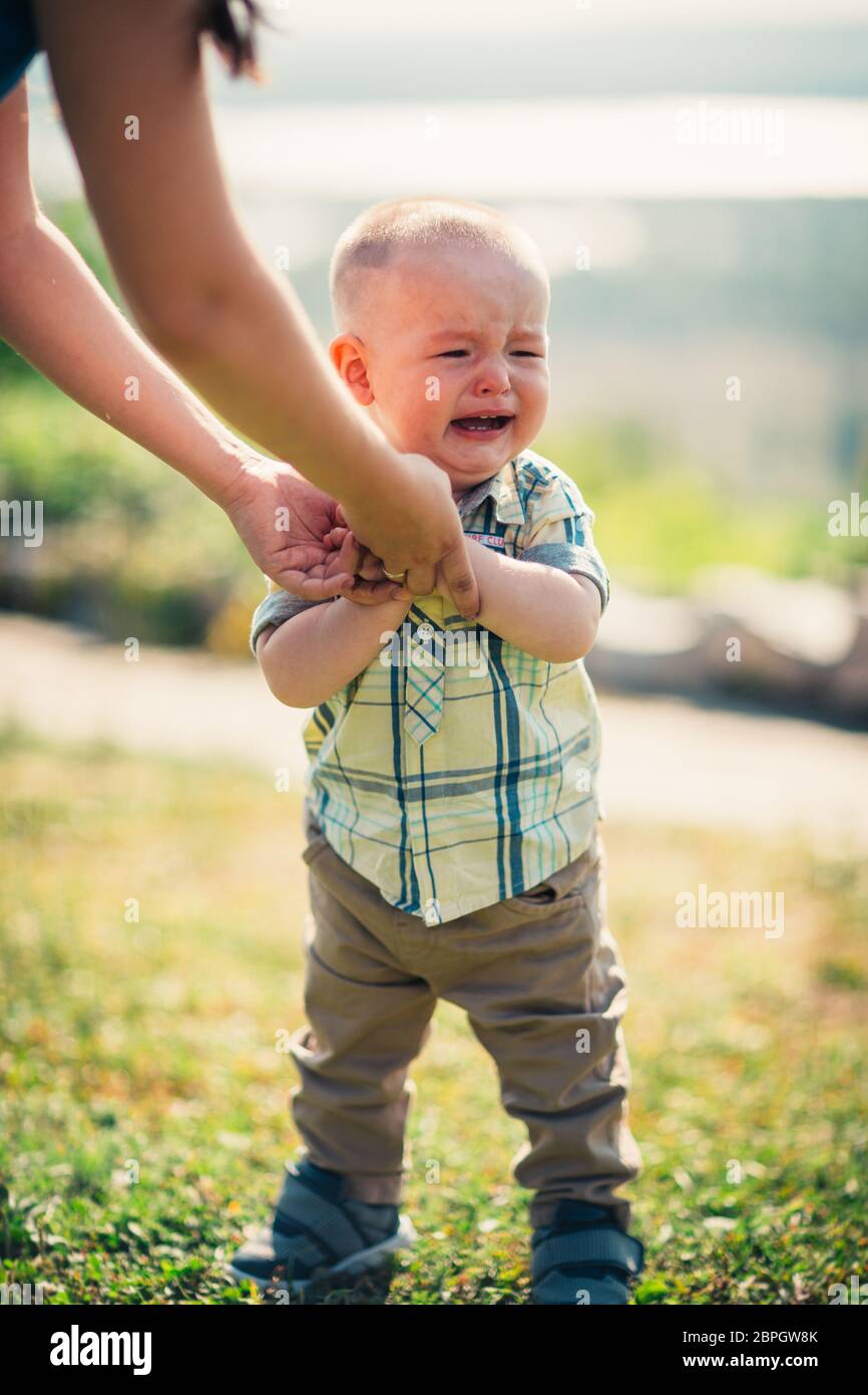 Toddler crying arms hi-res stock photography and images - Alamy