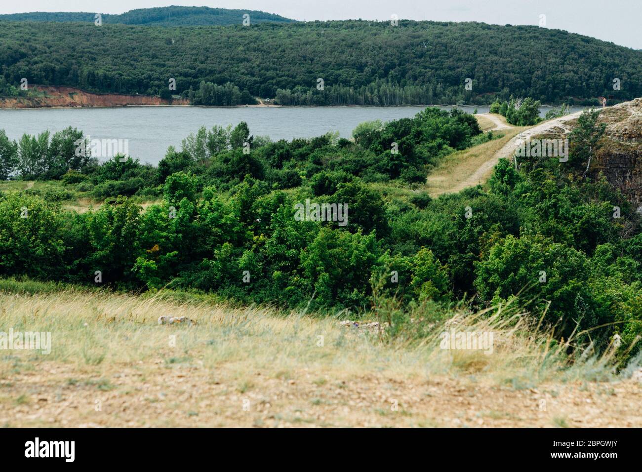 landscape river cliff grass on the sky background Stock Photo - Alamy