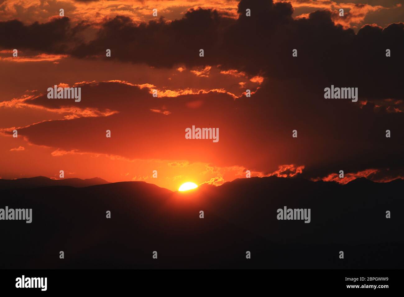 Red purple orange sunset sky landscape Stock Photo - Alamy