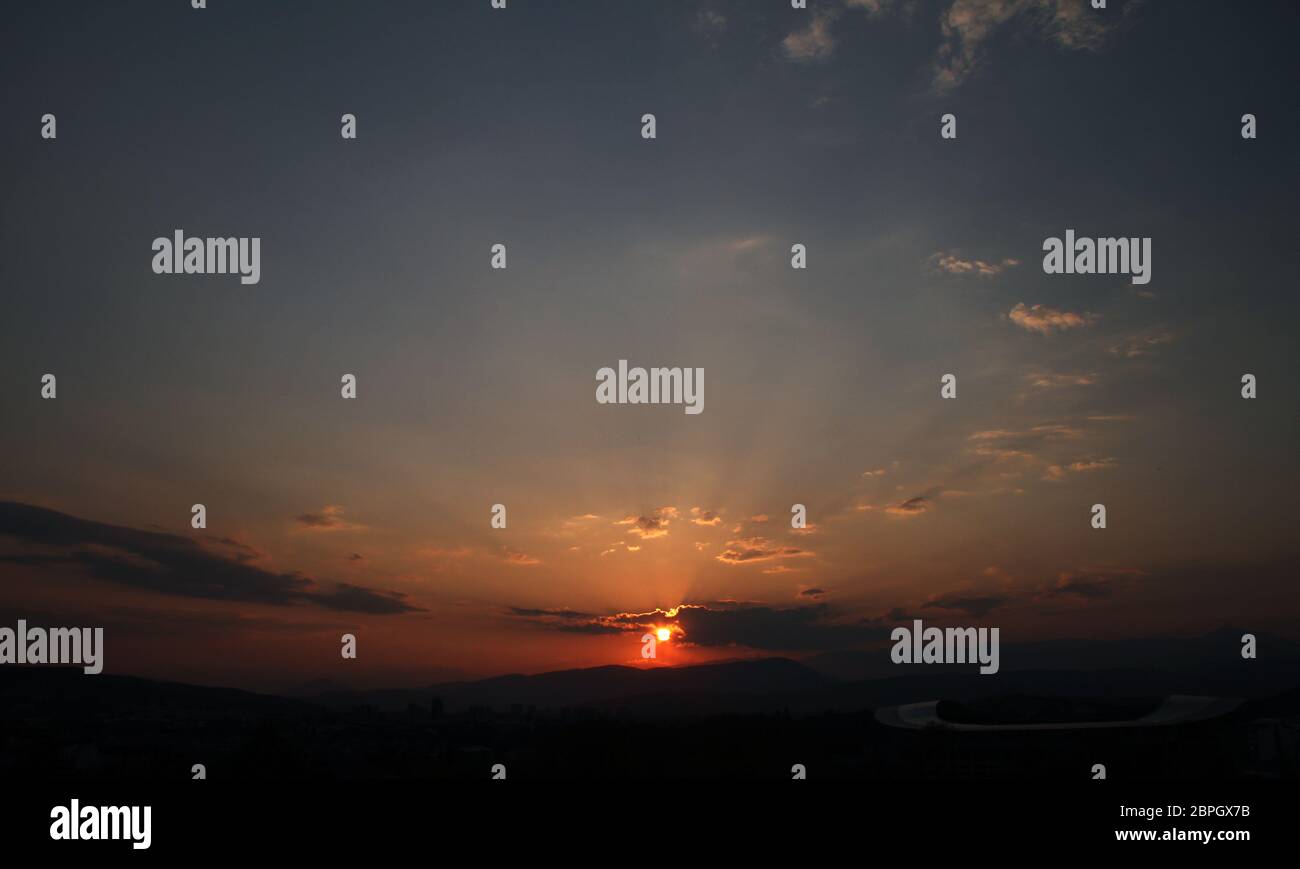 Red purple orange sunset sky landscape Stock Photo - Alamy