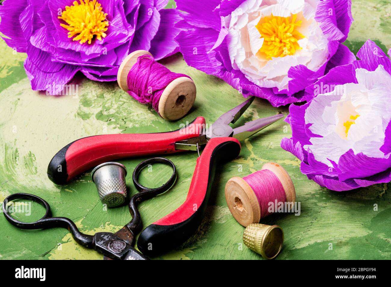 Colourful handmade paper flowers.Paper craft and tools Stock Photo - Alamy
