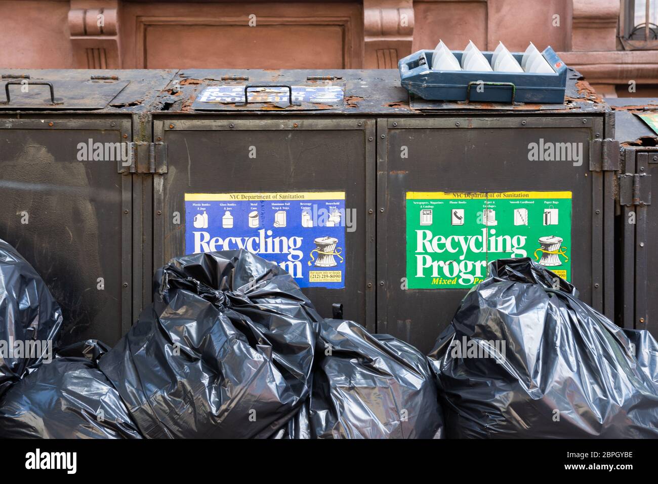 New York City, USA - July 1, 2019: old rusty recycling program trash ...