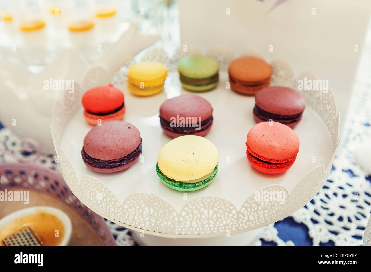 Macaroons Biscuits On White Stand Stock Photo - Alamy