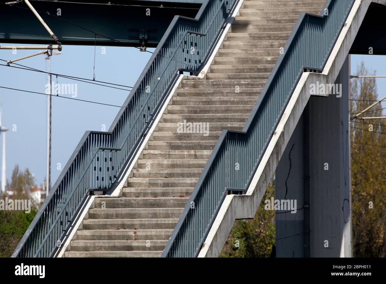 Concrete stairs and banisters on a pedestrian bridge, Germany, Europe ...