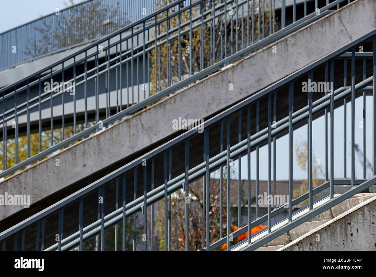 Concrete stairs and banisters on a pedestrian bridge, Germany, Europe ...