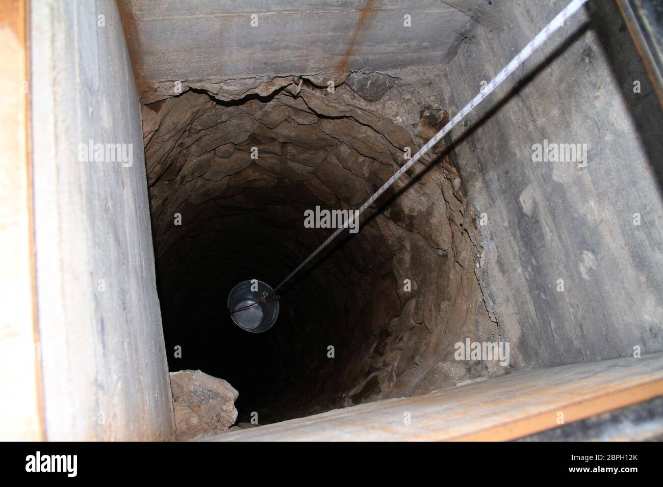 well hole, old way to fresh water Stock Photo - Alamy