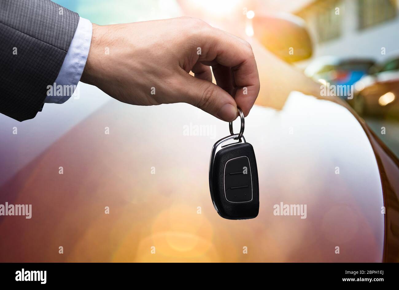 Robot hand giving car key hi-res stock photography and images - Alamy