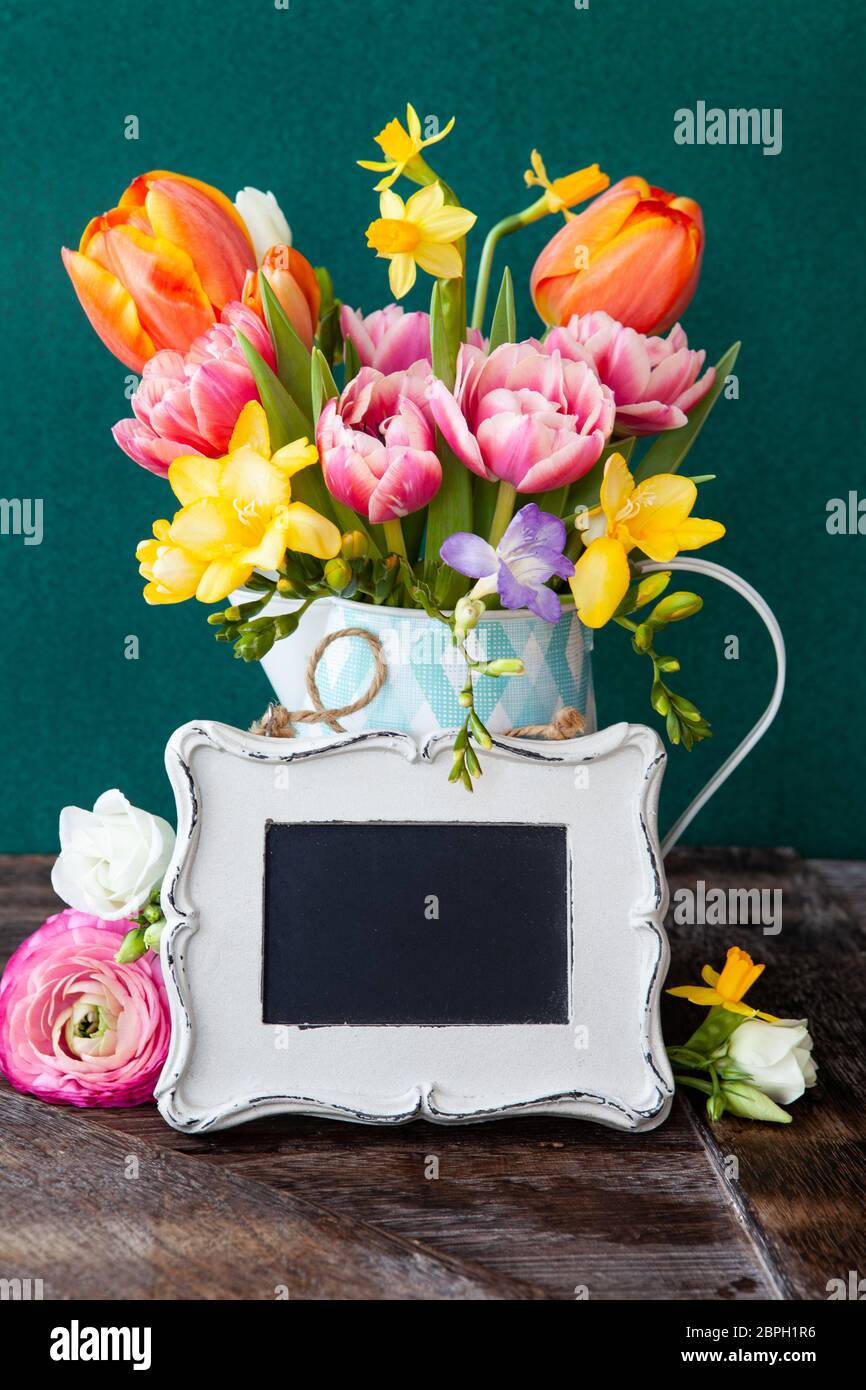 Little bouquet made from bright cheerful spring flowers Stock Photo - Alamy