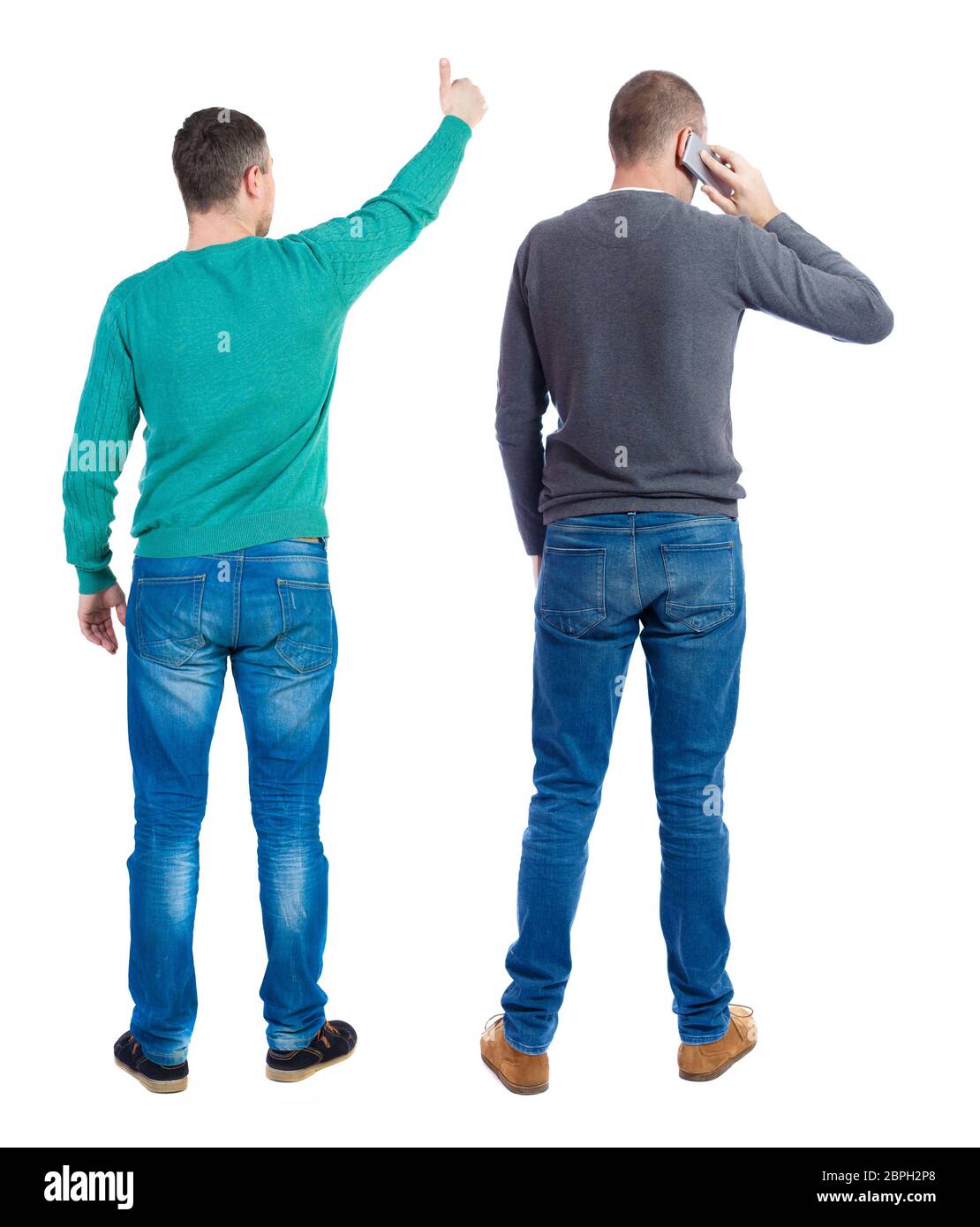Back view of two man in sweater with mobile phone. Rear view people ...