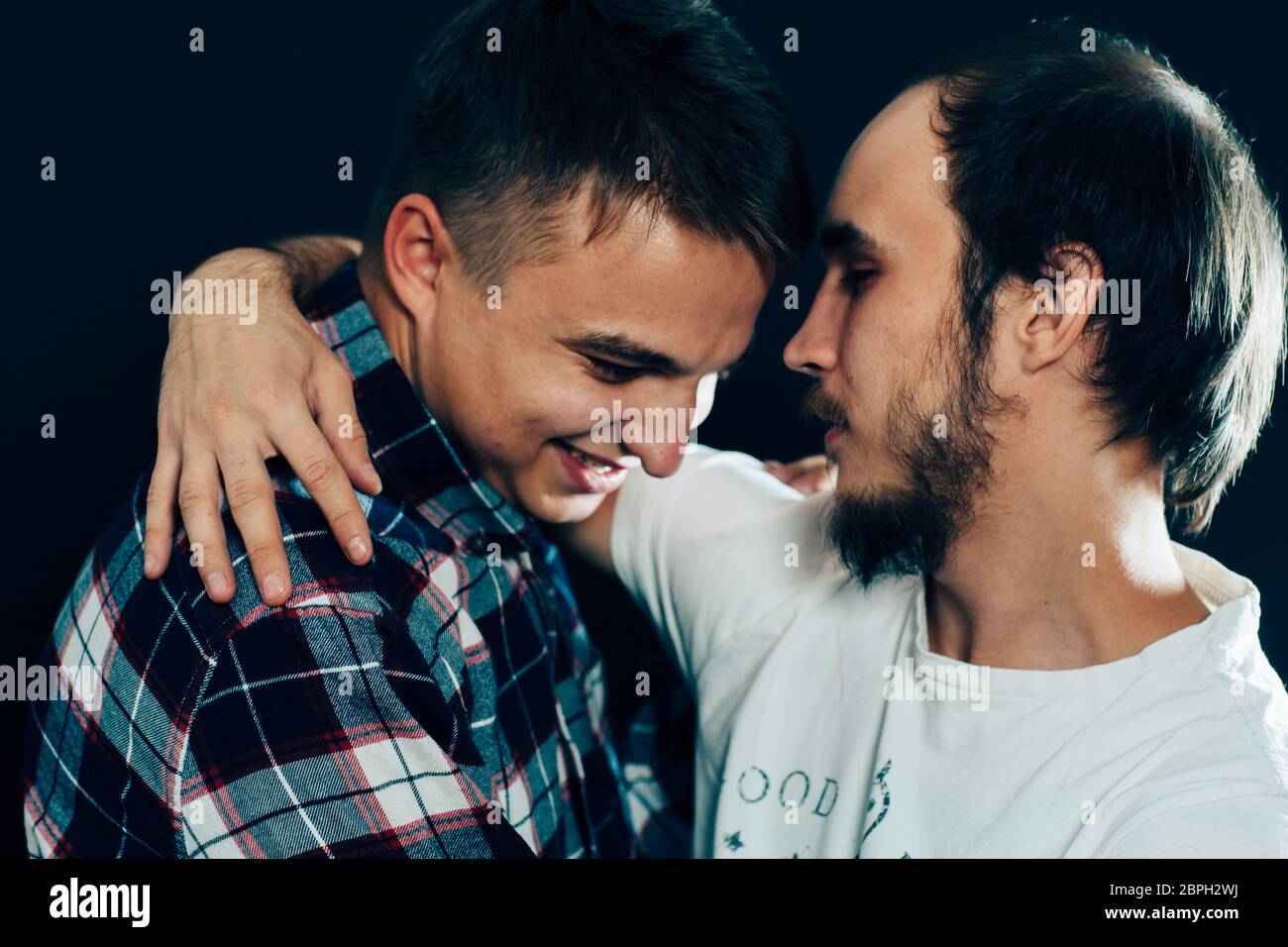 Guys hugging hi-res stock photography and images - Alamy