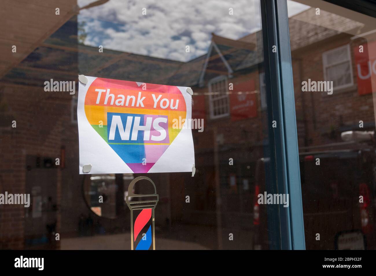 Support for the NHS rainbow heart in a shop window during the Covid-19 ...