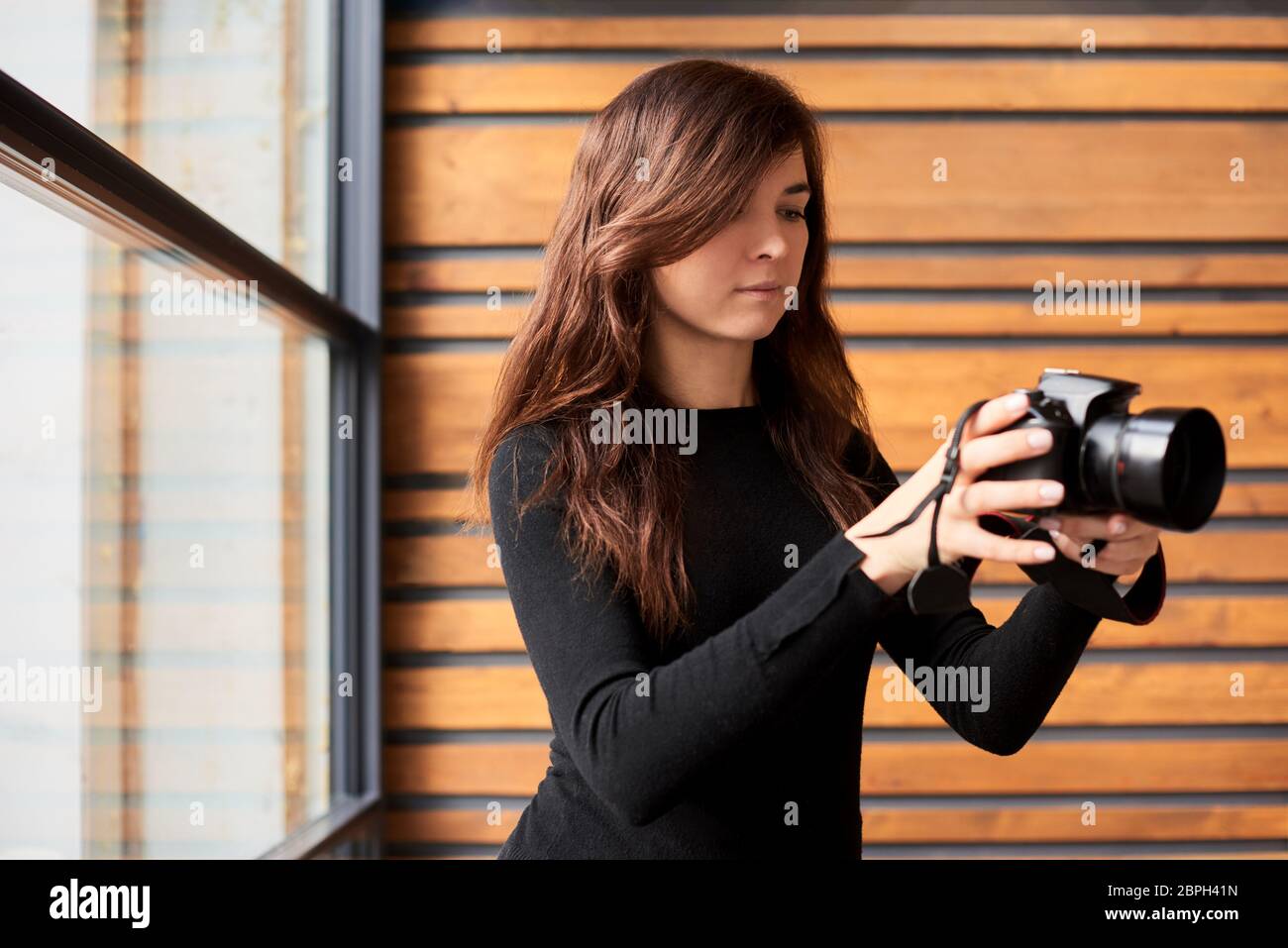 Woman taking a photo. photographer day concept Stock Photo - Alamy