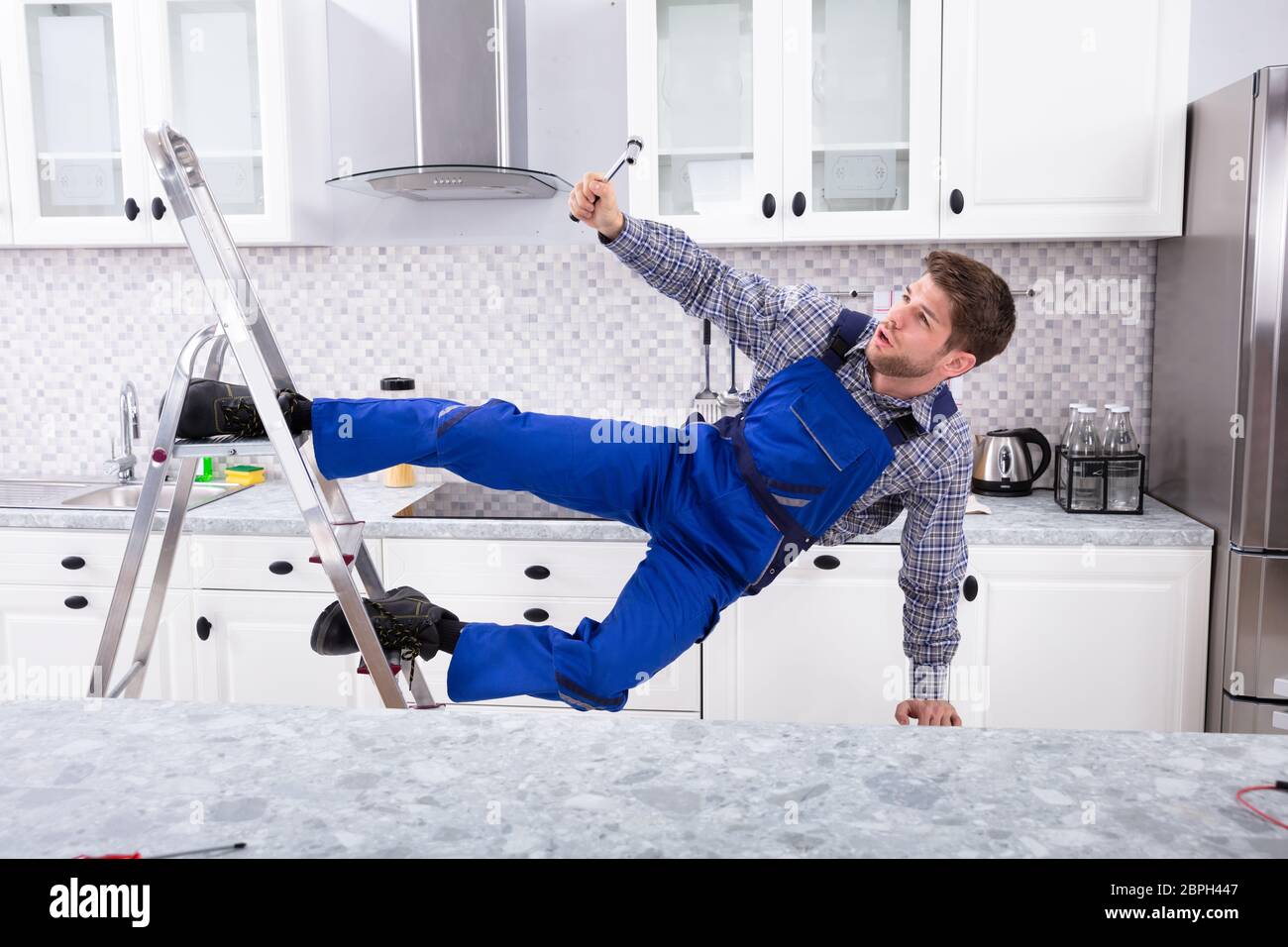 Man ladder kitchen hi-res stock photography and images - Alamy
