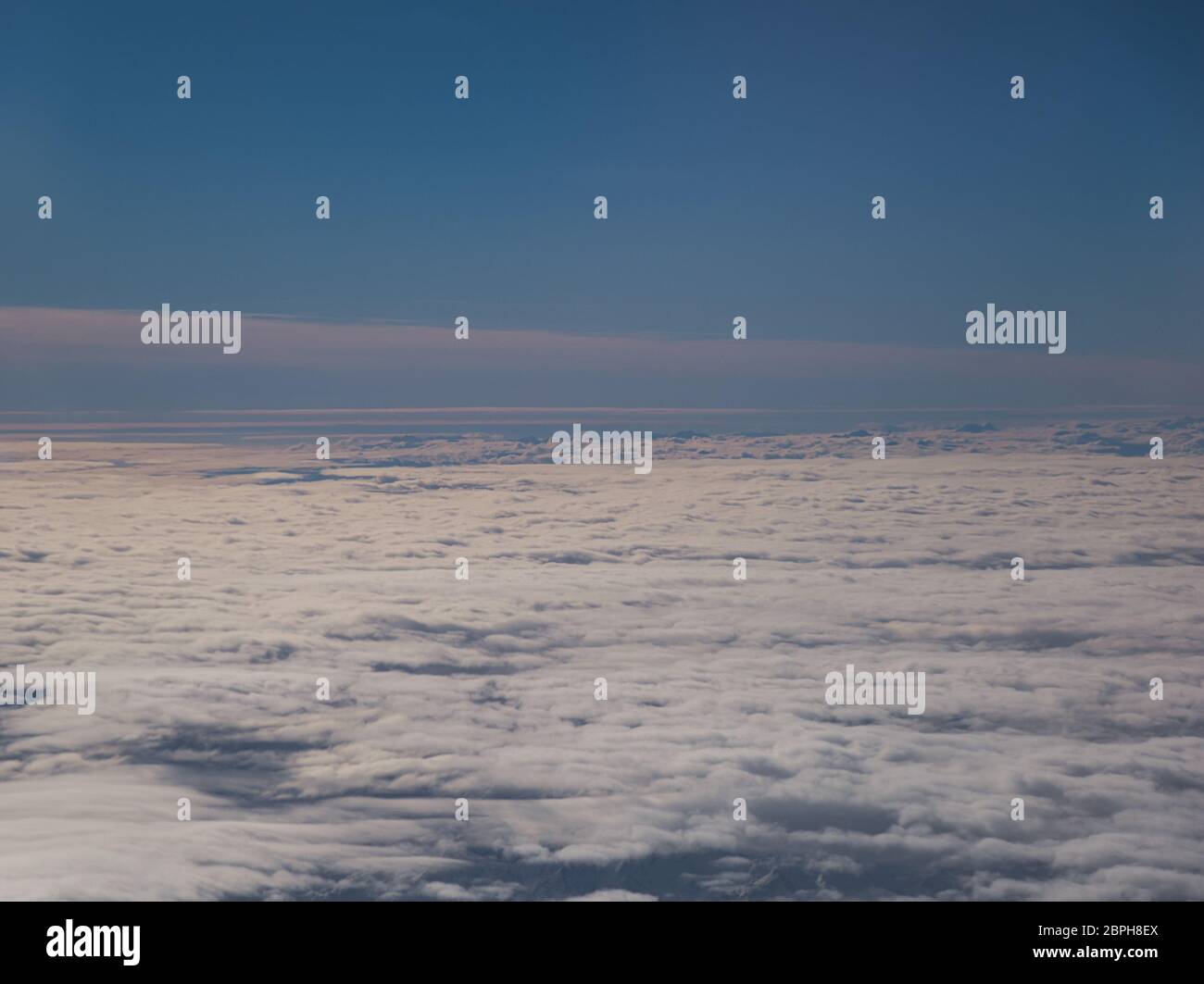 Flying over clouds layer High Resolution Stock Photography and Images ...