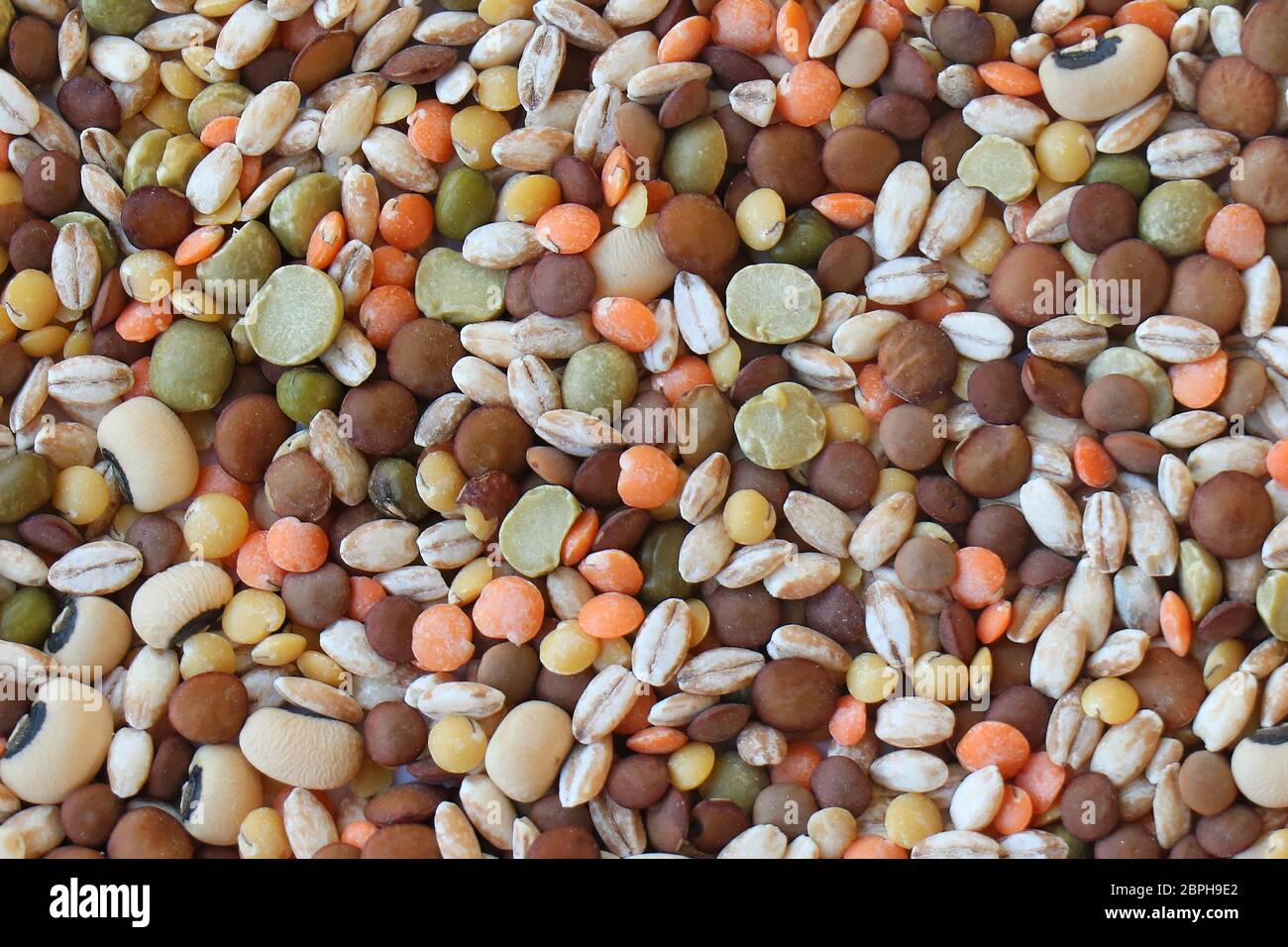 Colorful organic pulses mix of different organic legumes background ...
