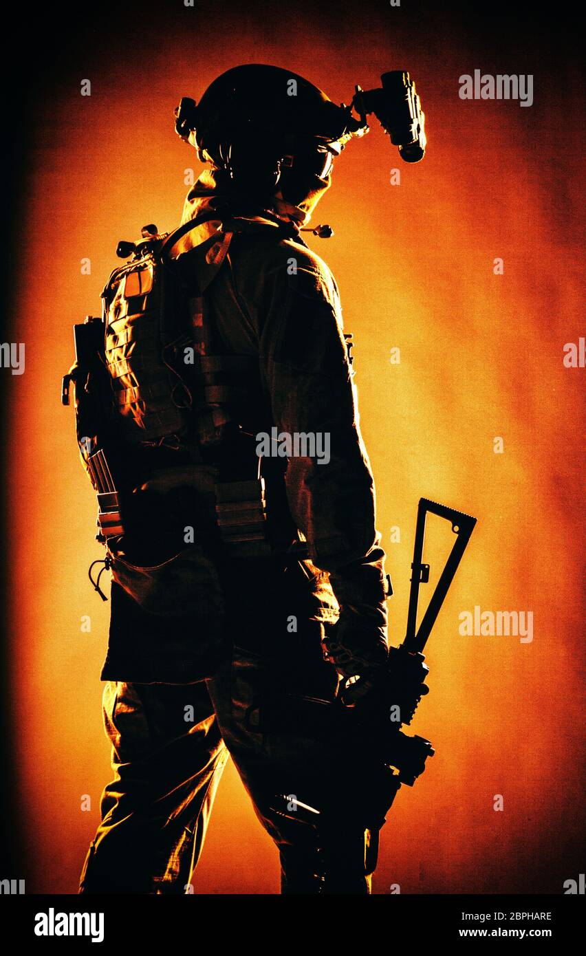Army special forces soldier in tactical ammunition, night vision device ...