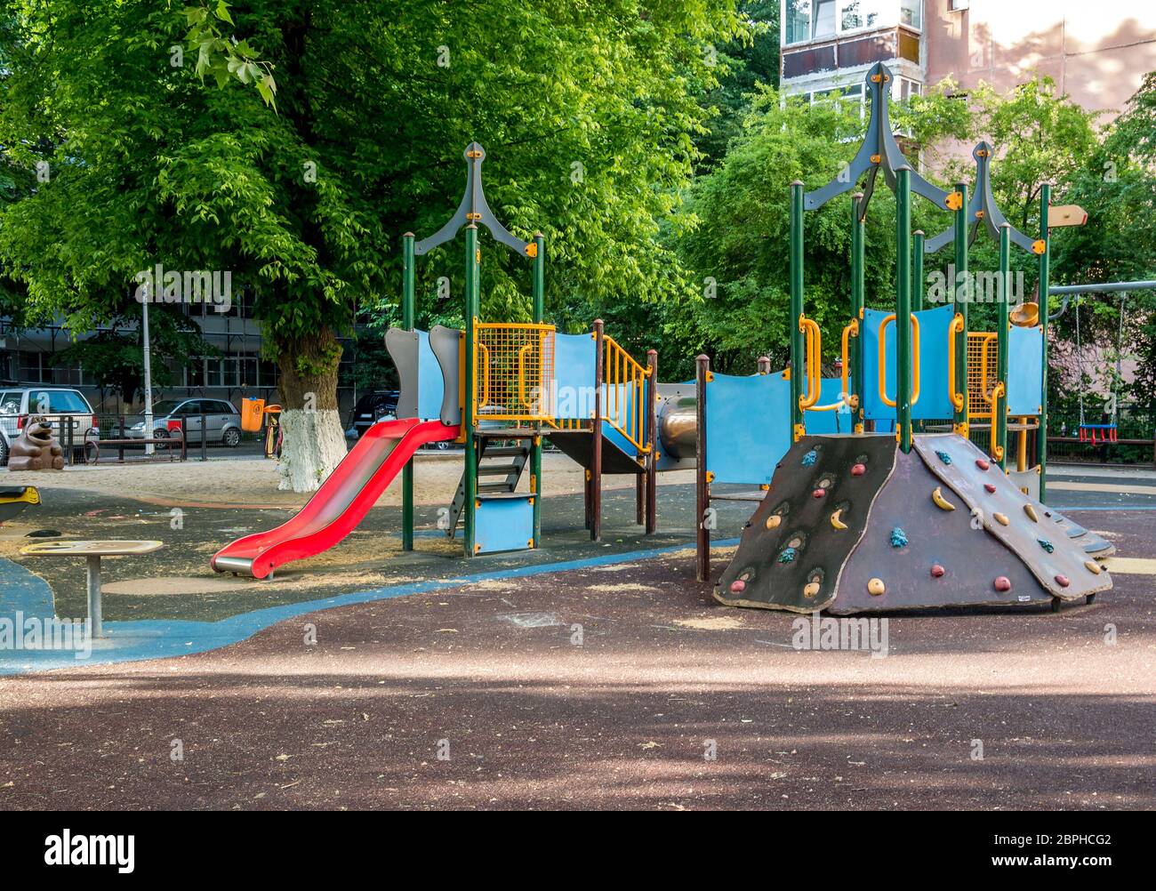 An empty children's playground in Bucharest, Romania. Children swings ...