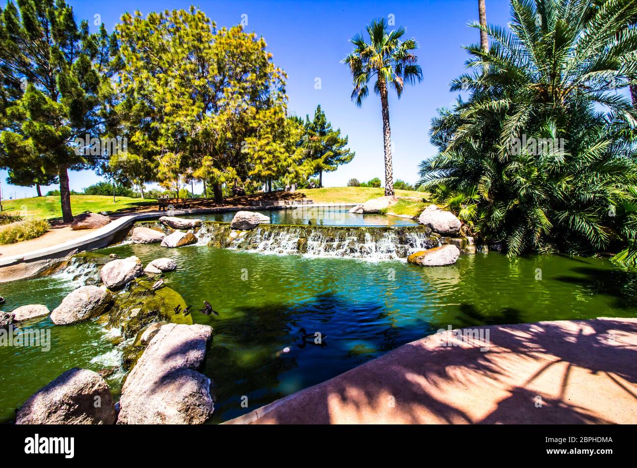 Series Of Ponds With Waterfalls In Public Park Stock Photo - Alamy