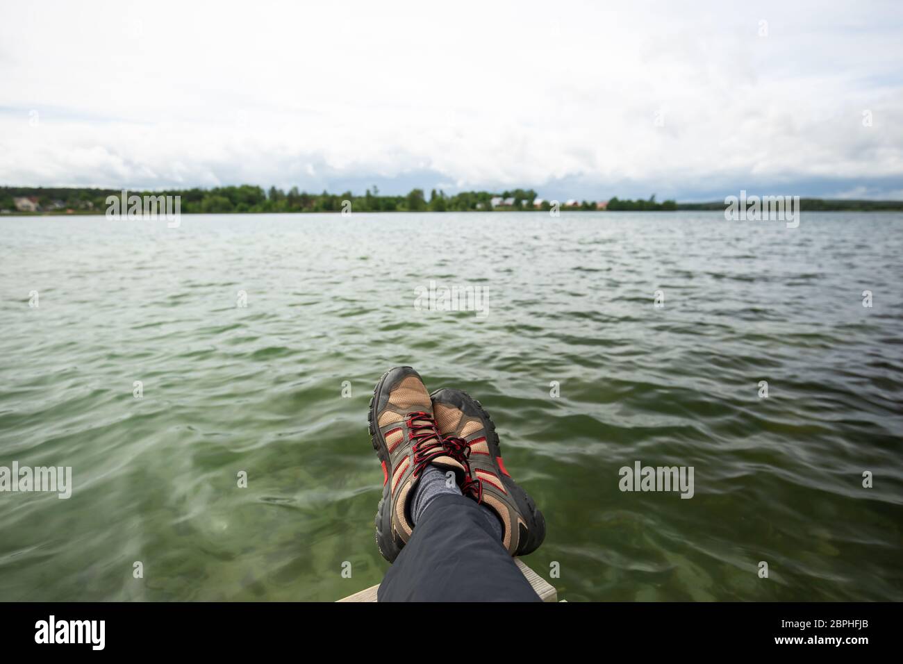 Crossed feet hi-res stock photography and images - Alamy