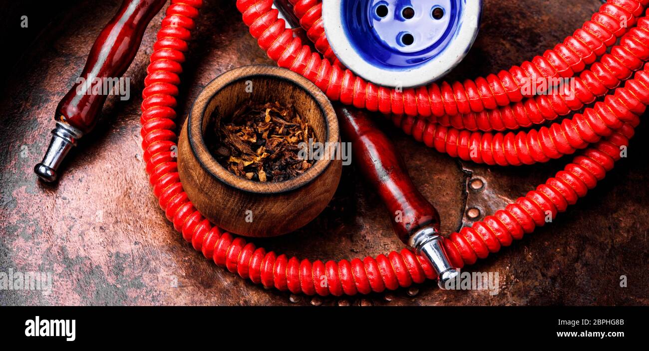 Turkish hookah .Smoking turkish shisha.Tobacco in a snuffbox and hookah ...