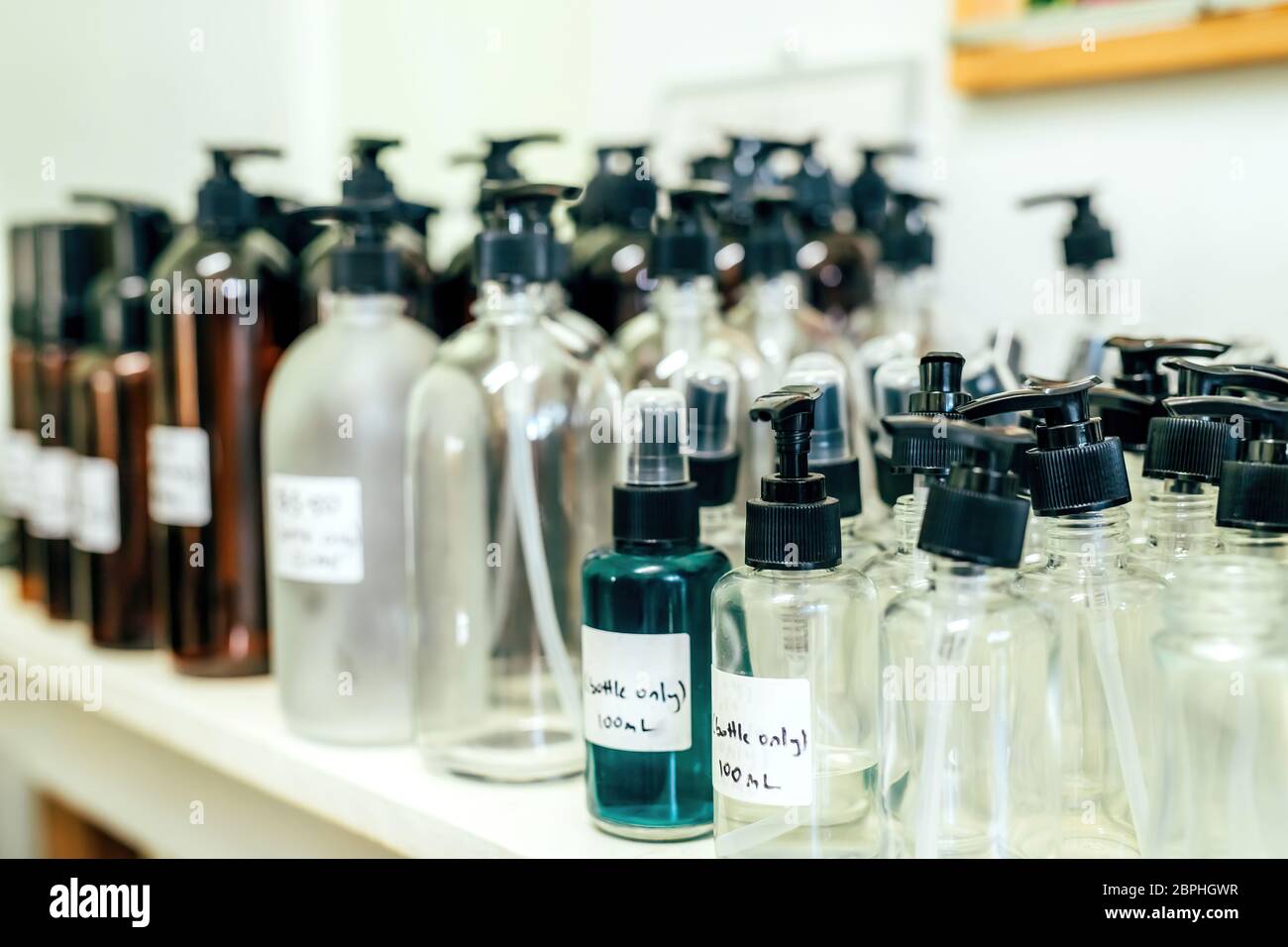 Different sizes pumping and spray bottles, recycling materials in a ...