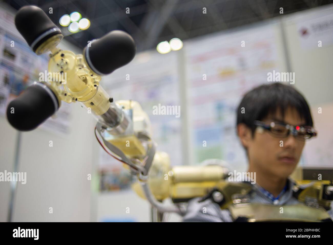 An assisting robot is demonstrated during the Japan Robot Week ...