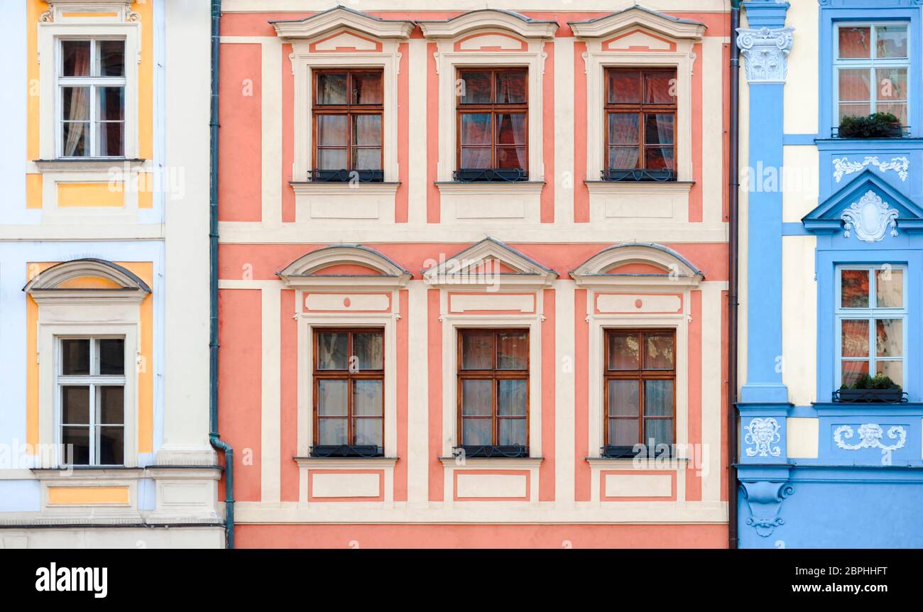 Colorful buildings facade with many windows. Historical buildings in ...