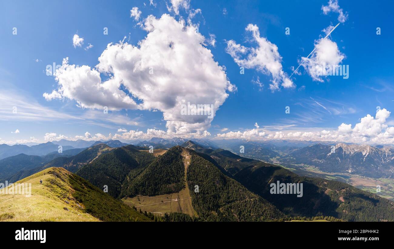 Beautiful mountain panorama on Italian Alps with blue sky and clouds ...