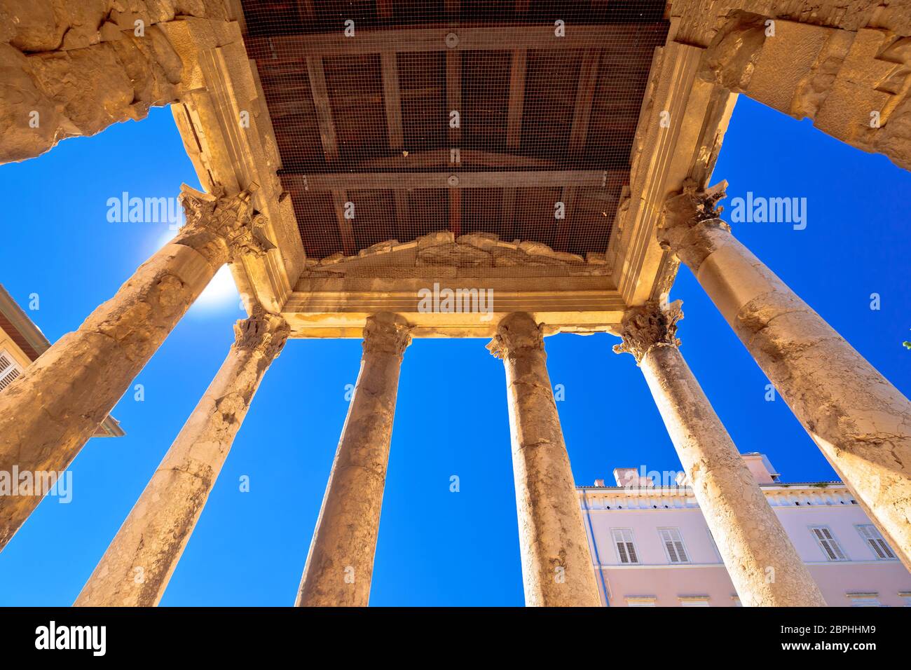 Forum square in Pula historic roman Temple of Augustus pillars view ...