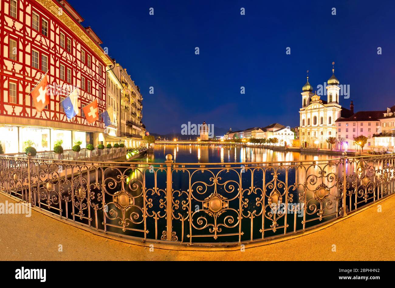 Luzern evening view of famous landmarks and Reuss river, central ...