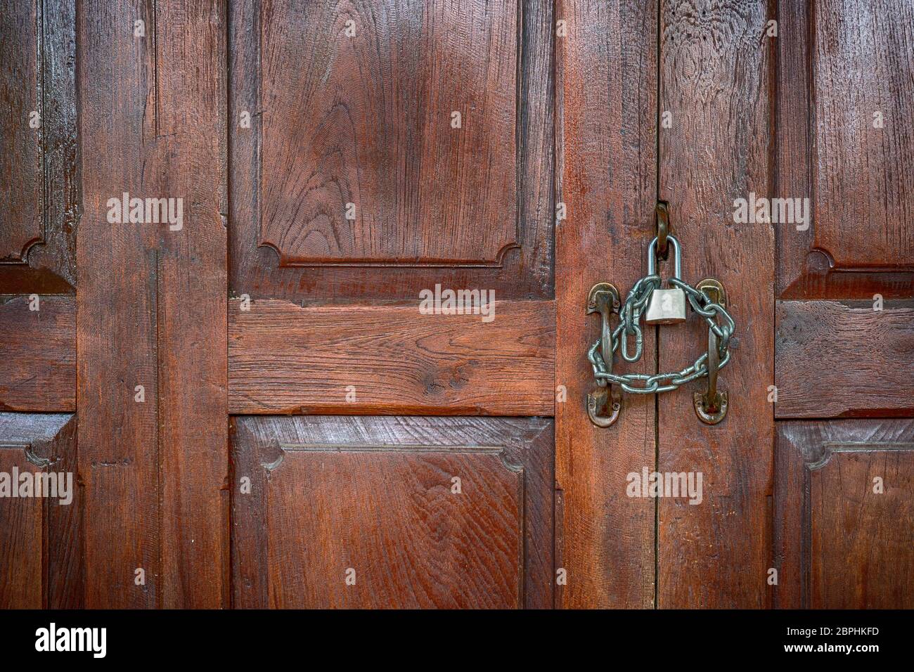 Old rusty and key locks on wooden door Stock Photo - Alamy