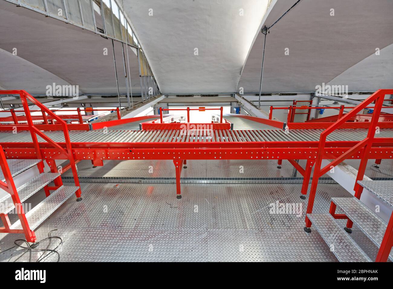 Production Line With Conveyor Rollers in Factory Stock Photo - Alamy