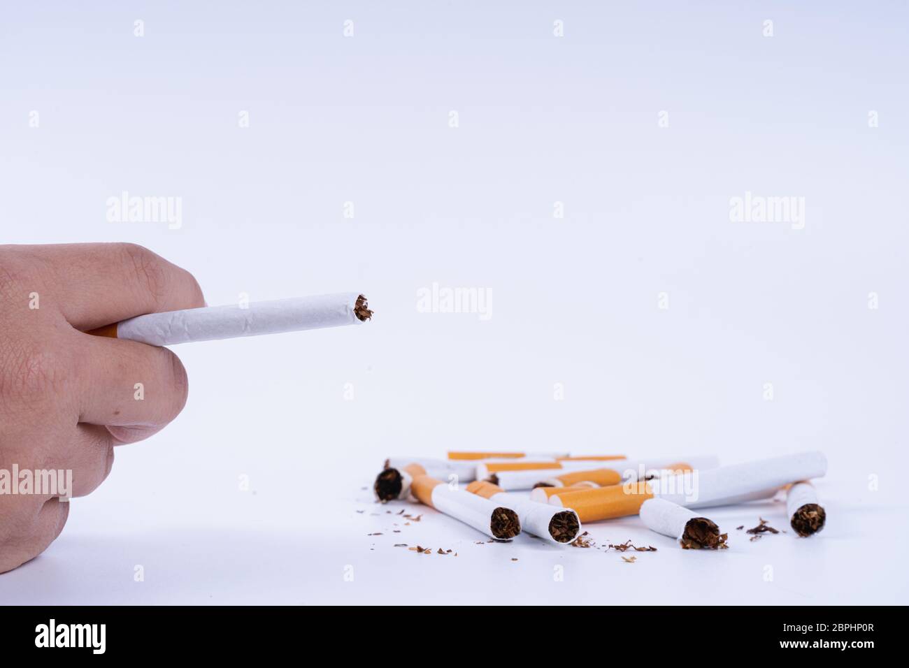 Man hold a cigarette with his hand. Stop smoking campaign. World no ...