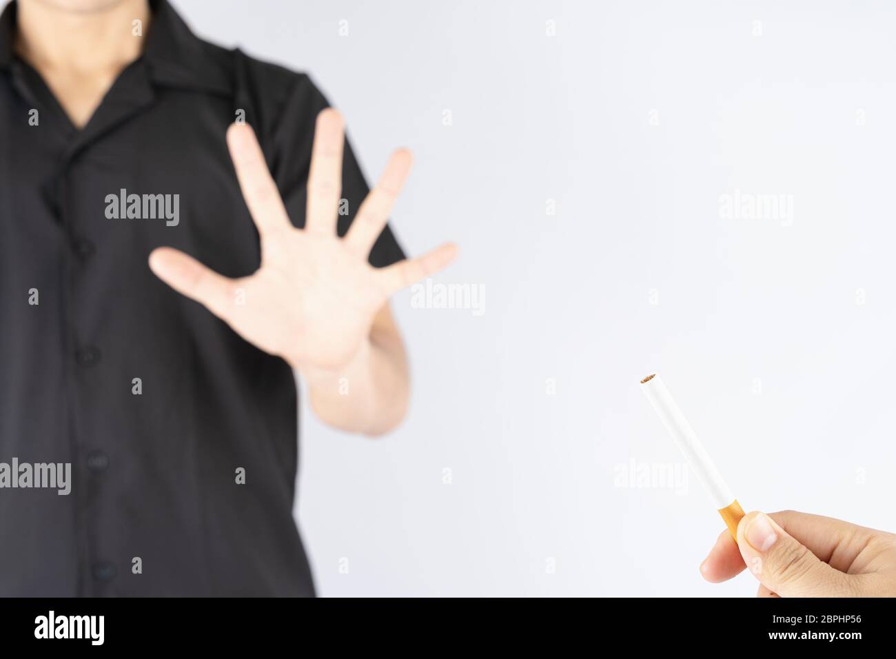 Healthy young man refusing to take cigarette quit of smoking concept ...