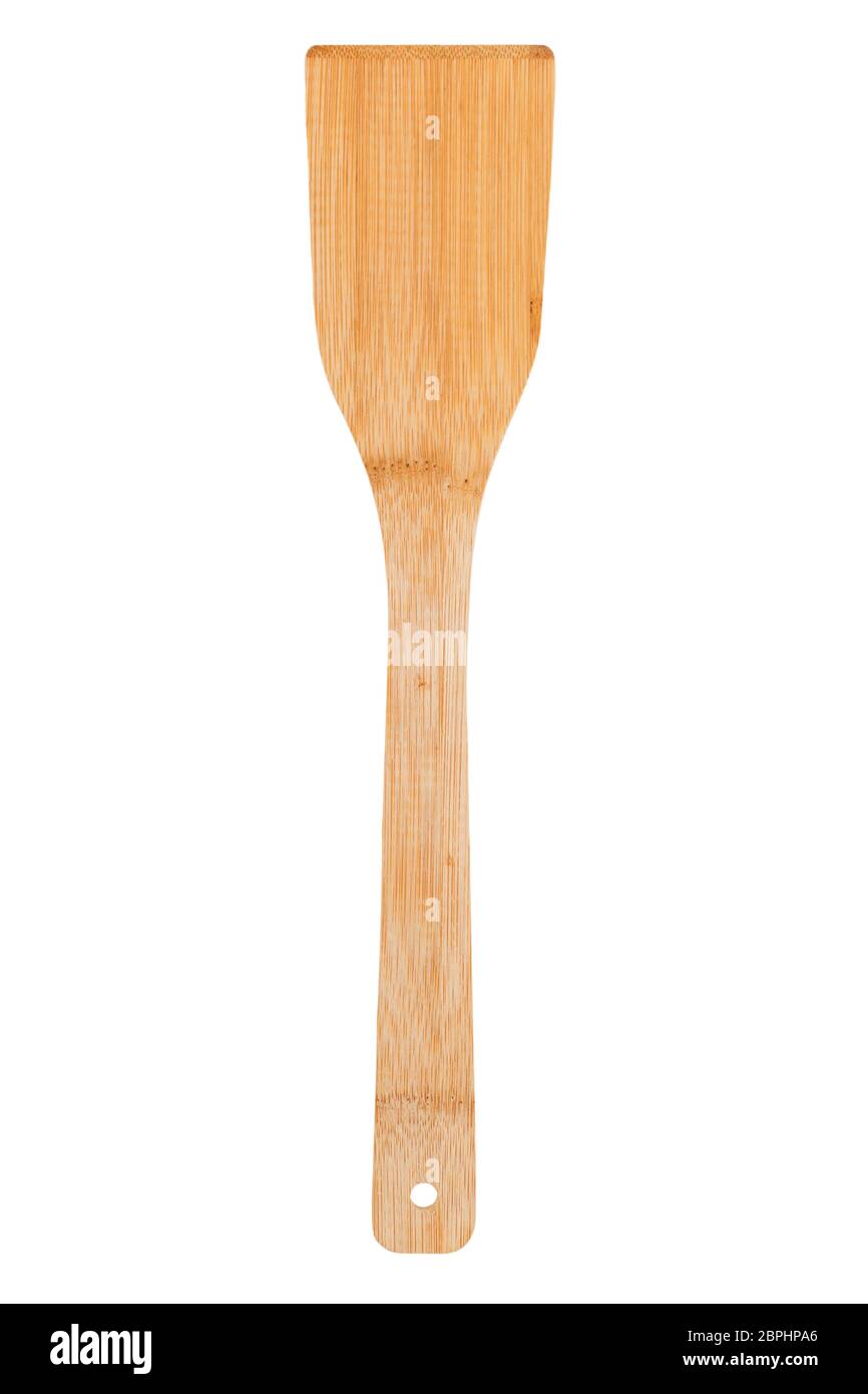 Rustic wooden spatula, useful kitchen tool, close-up isolated on white ...