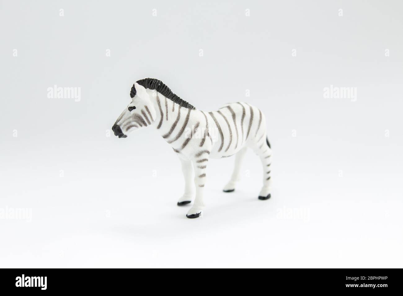 toy zebra on white background Stock Photo - Alamy